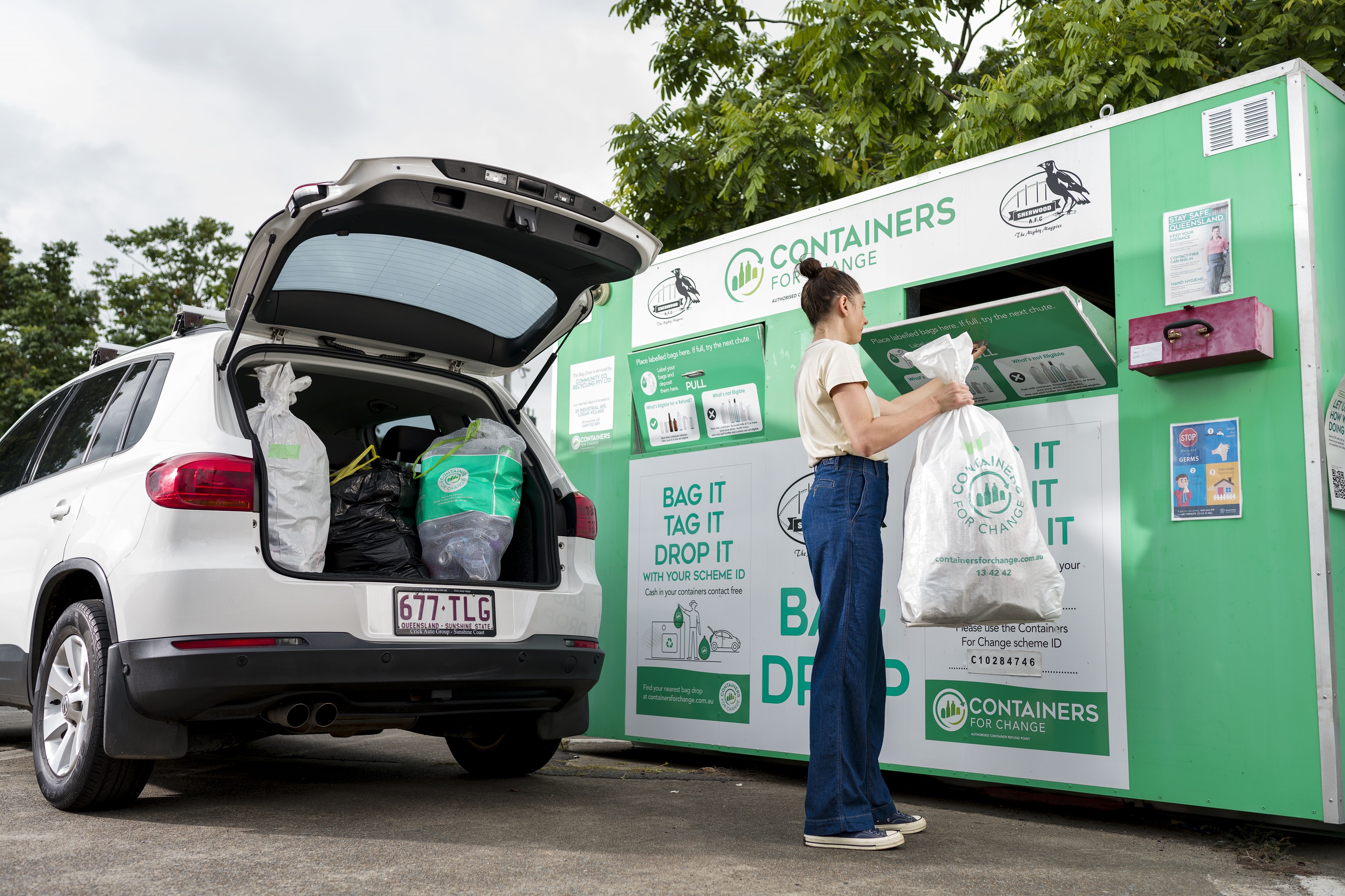 Person using bag drop | Containers for Change
